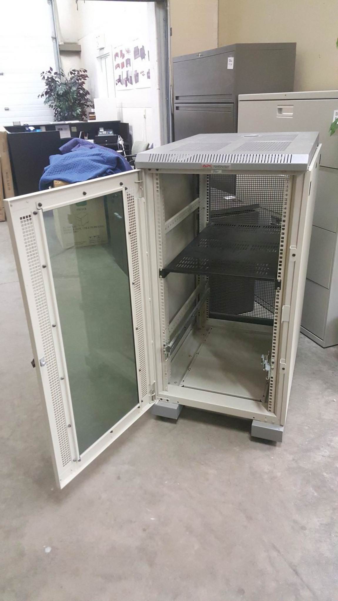 Gray & Beige APC Netshelter AR1100A 22U Server Rack by APC